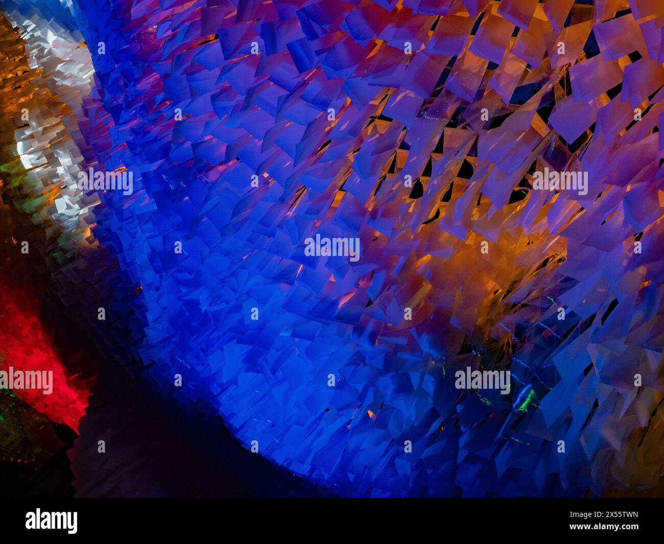 psychedelic light projected on recycle plastic flags Stock Photo - Alamy