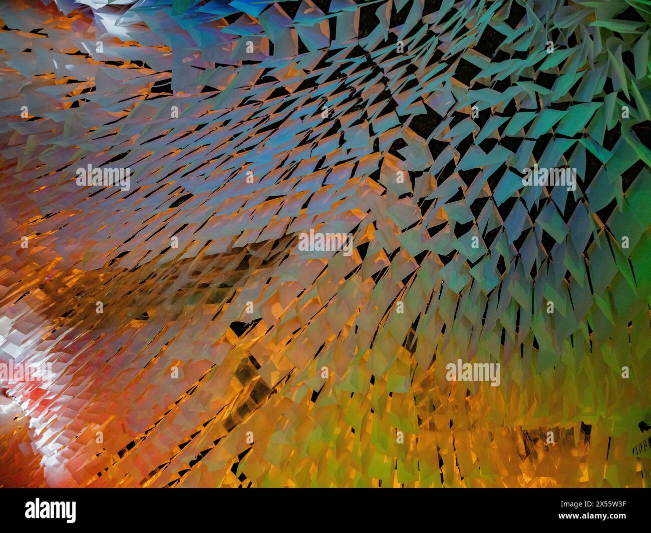 psychedelic light projected on recycle plastic flags Stock Photo - Alamy