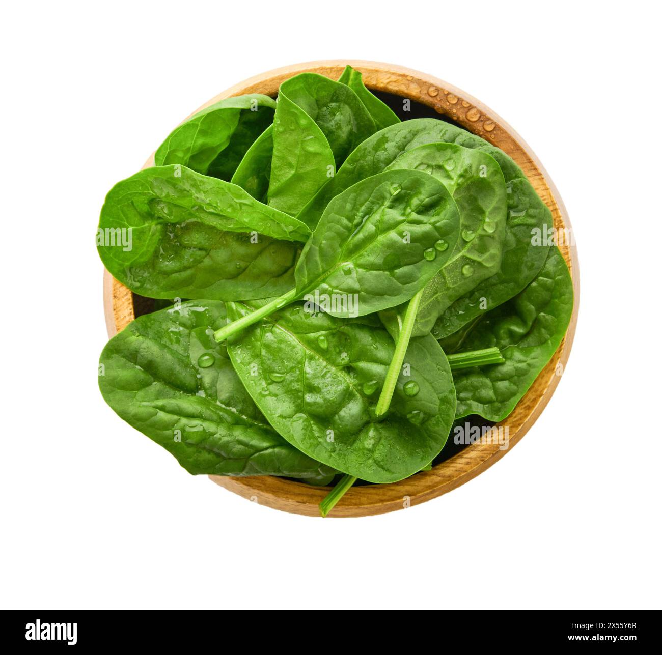 Spinach green leaves. Pile of green spinach leaves in wooden bowl top ...