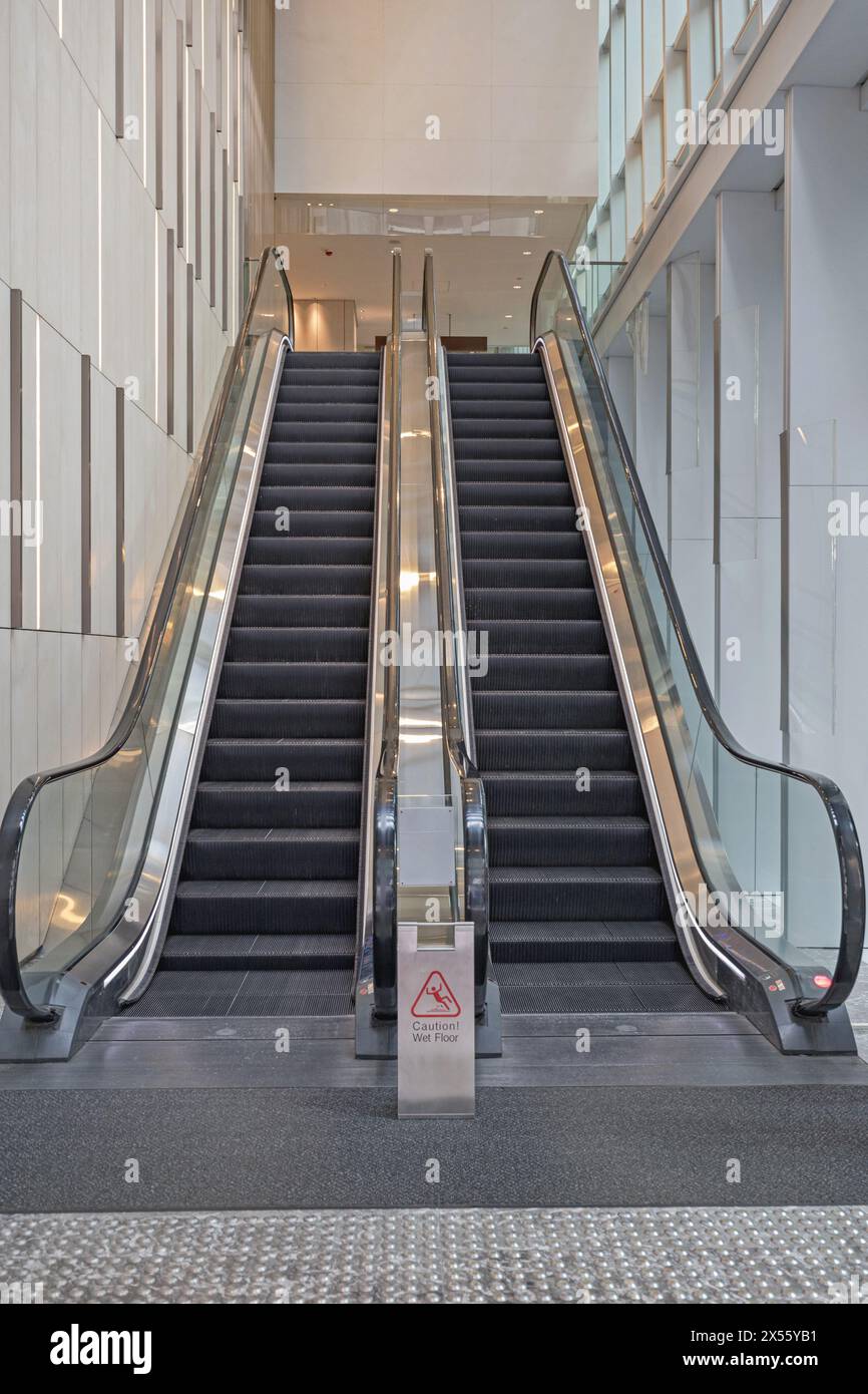 Building Entrance to Upper Floor by Two Escalators Stock Photo - Alamy