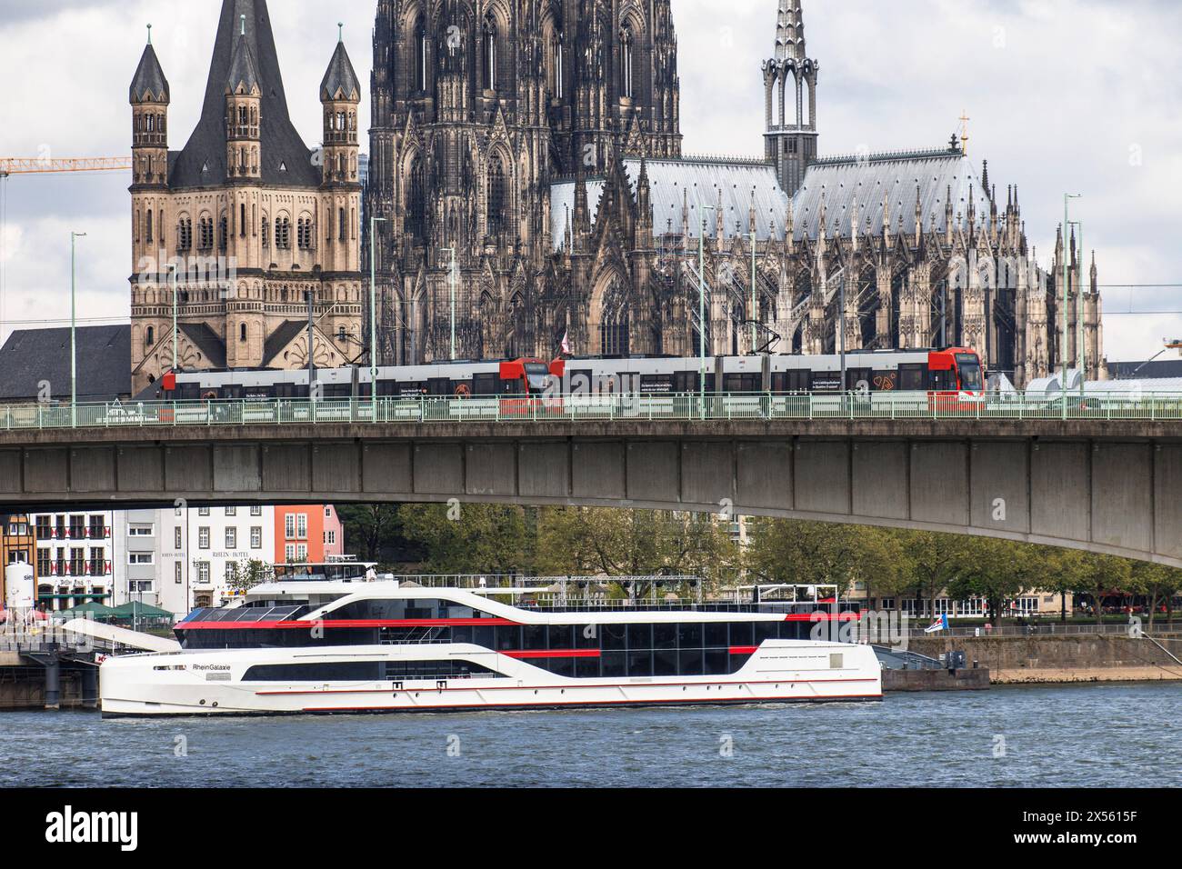 view over the river Rhine to Deutzer bridge, church Gross St. Martin ...