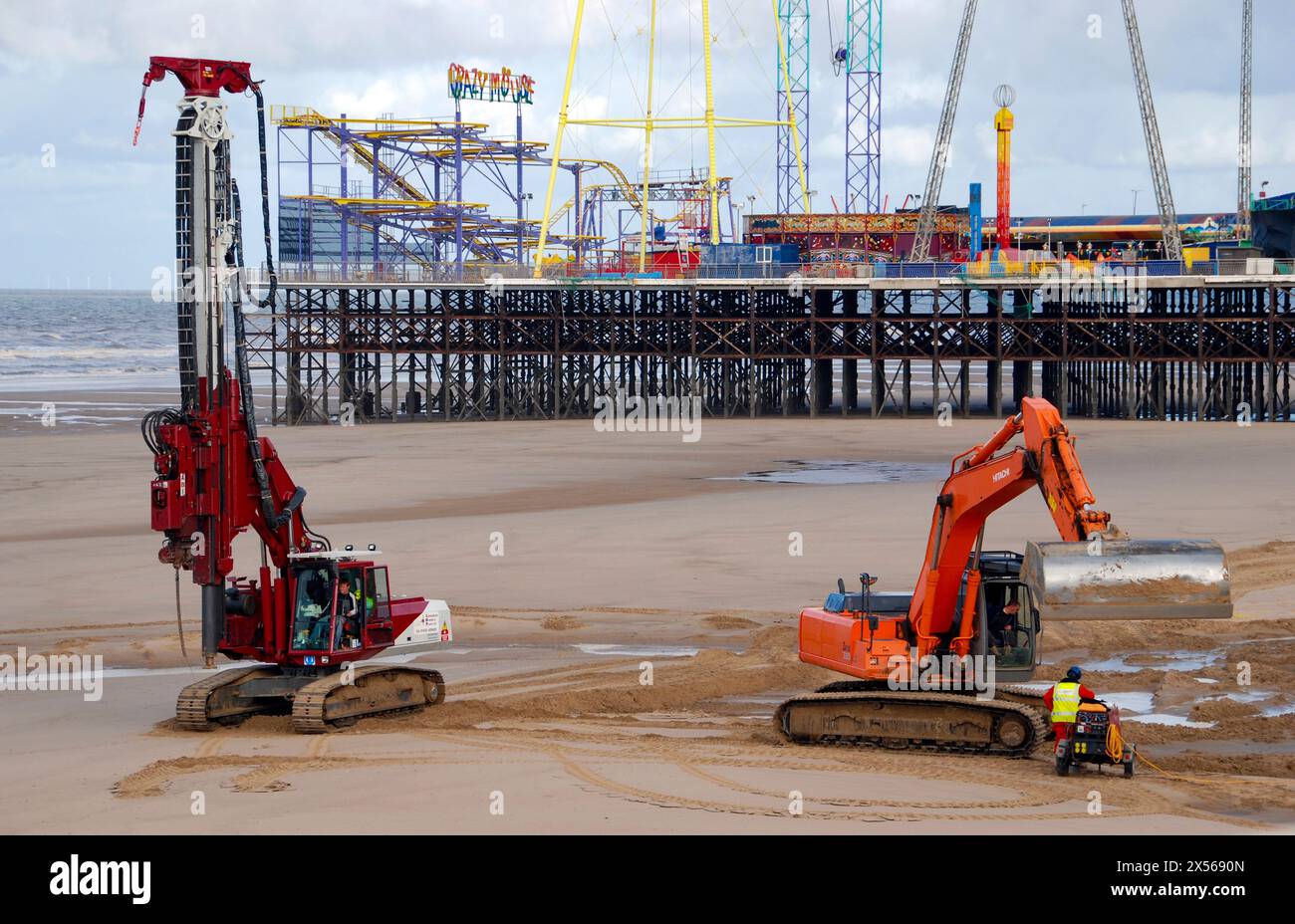 Drilling machinery on a beach Stock Photo - Alamy
