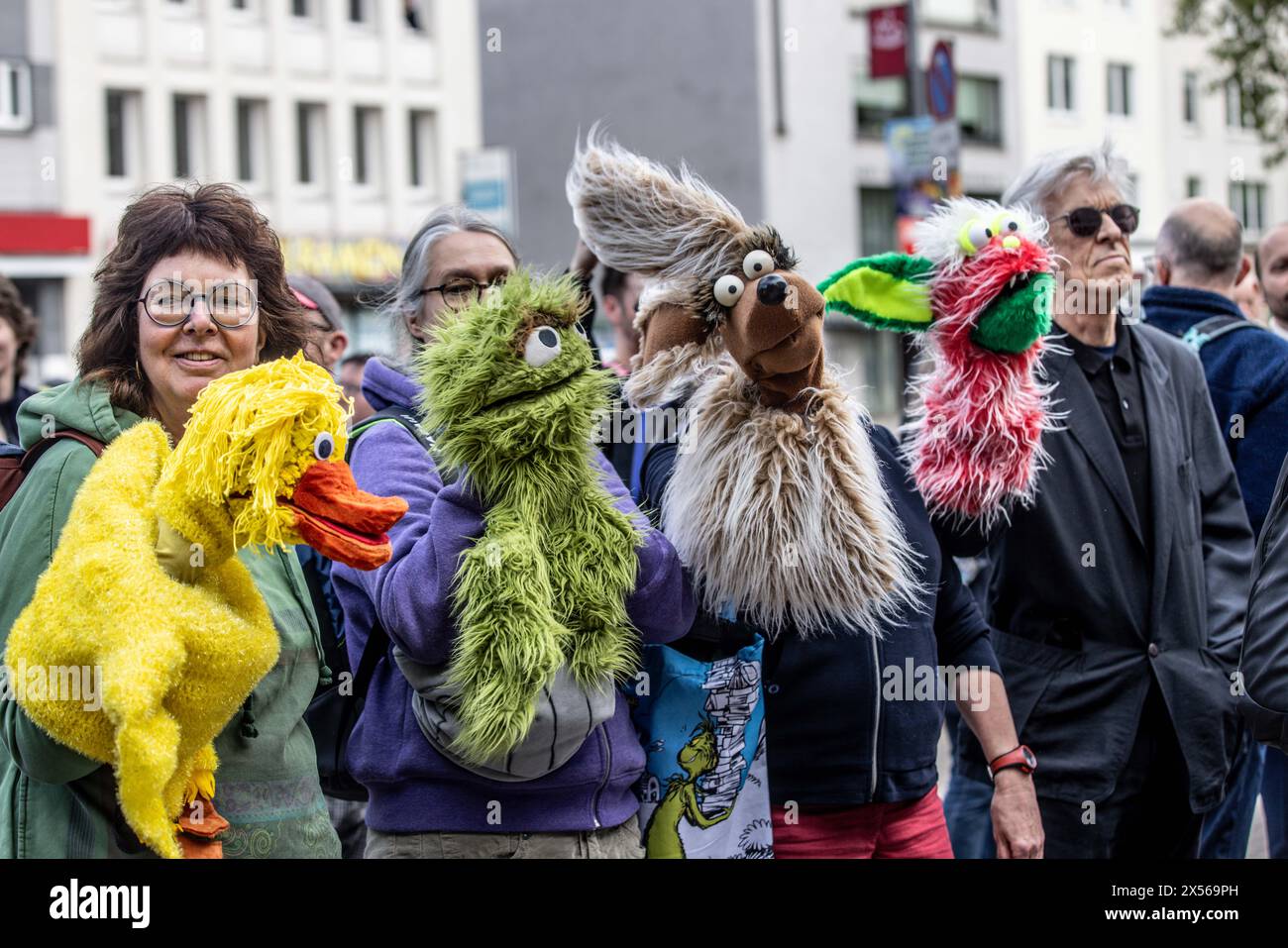 Bochum, Germany. 07th May, 2024. People holding various hand puppets at ...