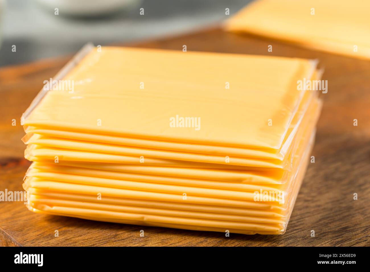 Yellow Cheddar American Cheese Singles in a Stack Stock Photo - Alamy