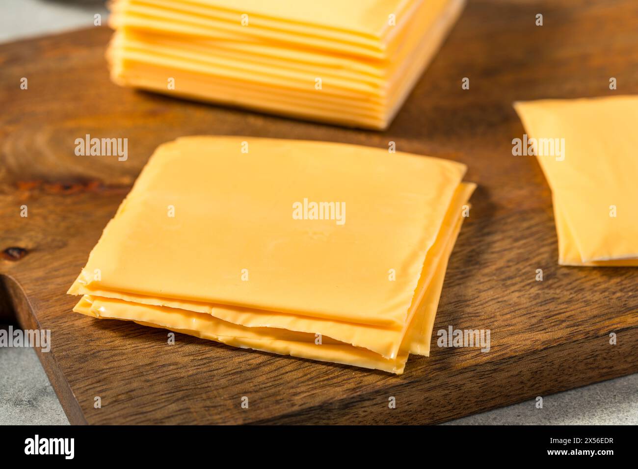 Yellow Cheddar American Cheese Singles in a Stack Stock Photo - Alamy