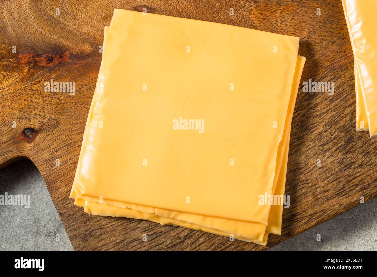 Yellow Cheddar American Cheese Singles in a Stack Stock Photo - Alamy