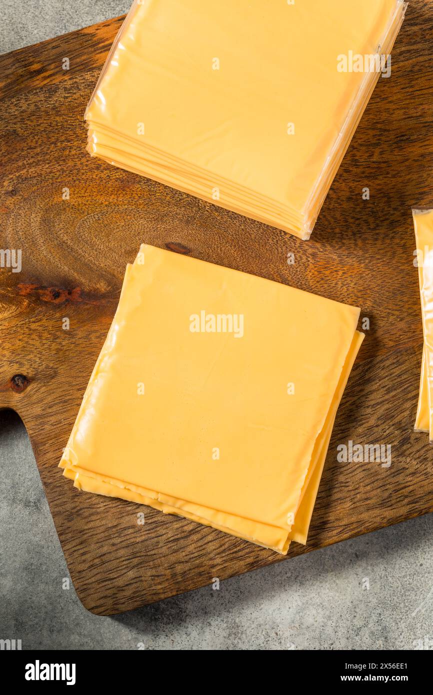 Yellow Cheddar American Cheese Singles in a Stack Stock Photo - Alamy