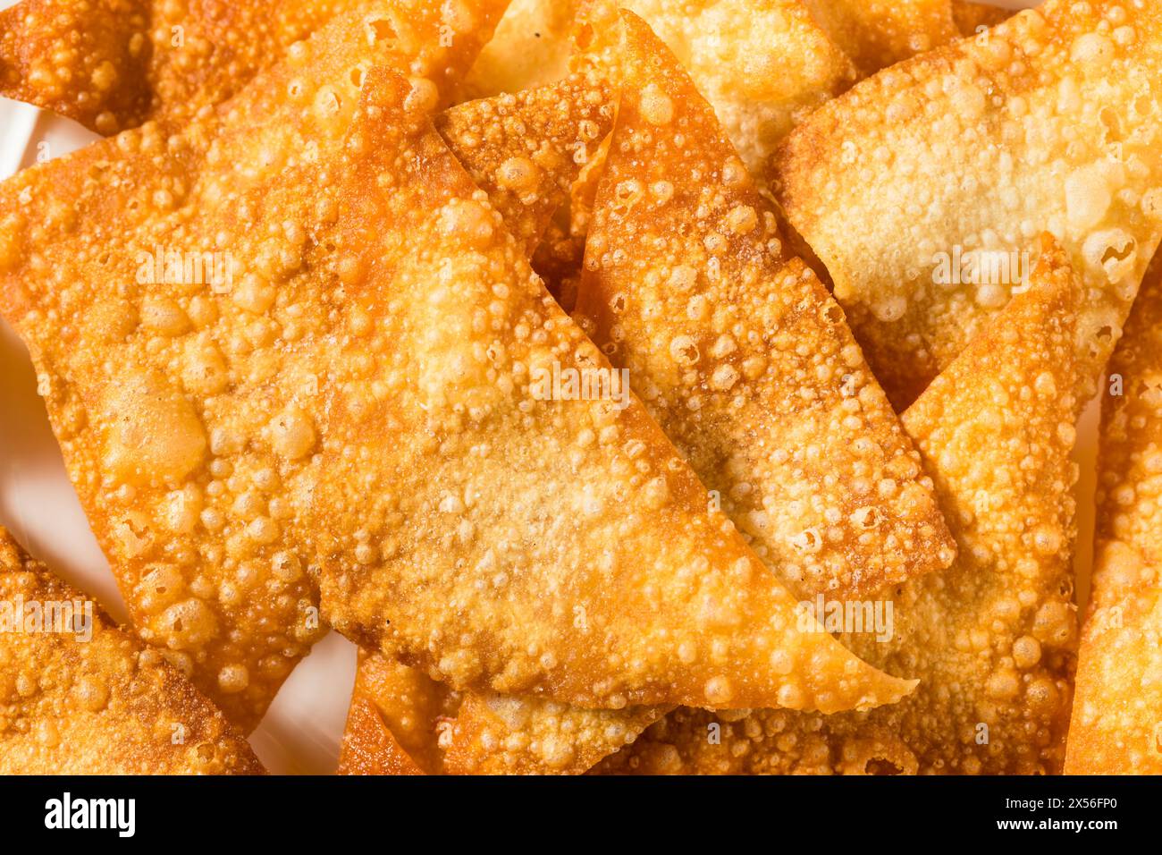 Homemade Deep Fried Chinese Wonton Chips Ready to Eat Stock Photo - Alamy
