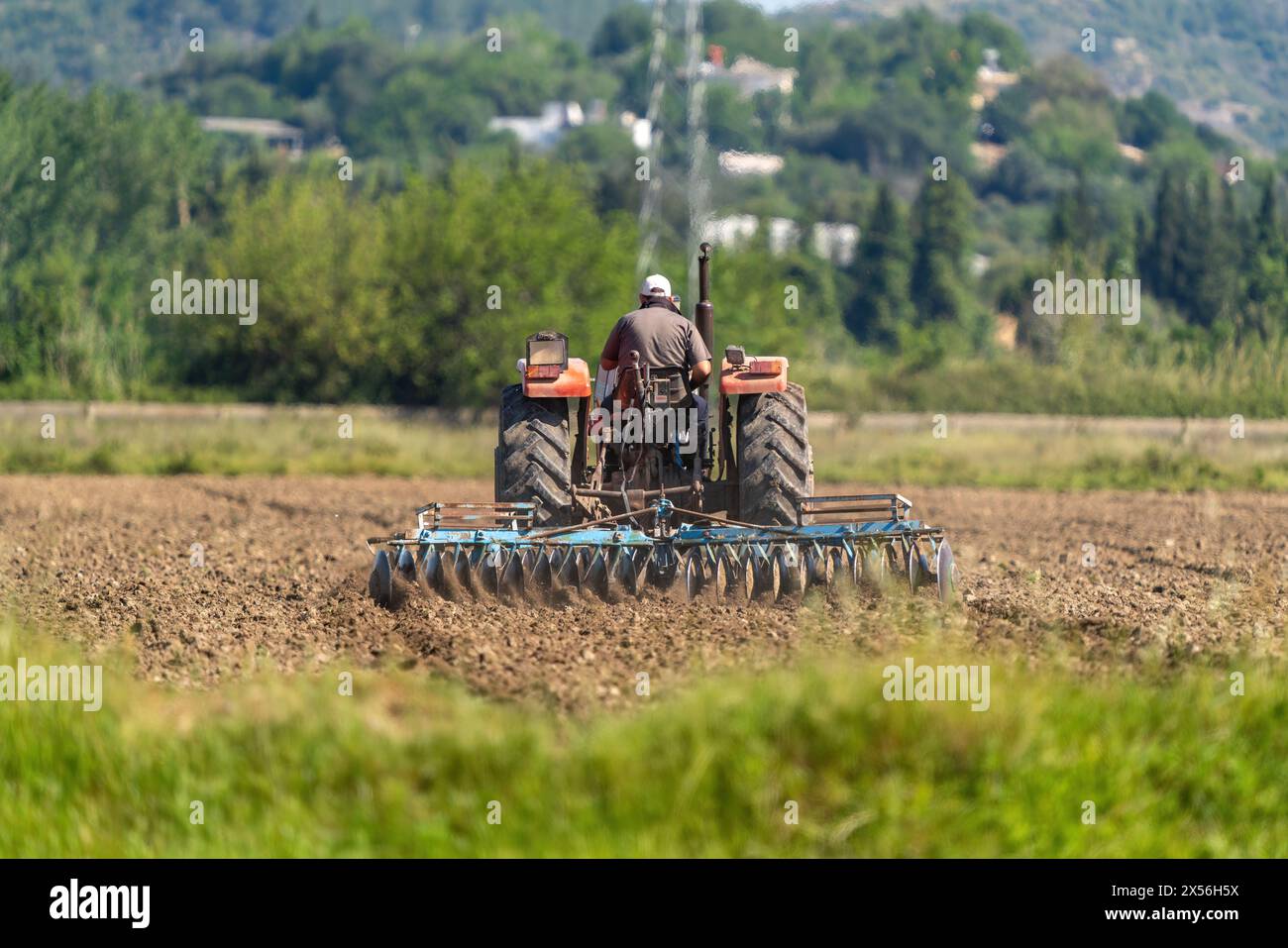 Farmer ploughing ground traditional hi-res stock photography and images ...