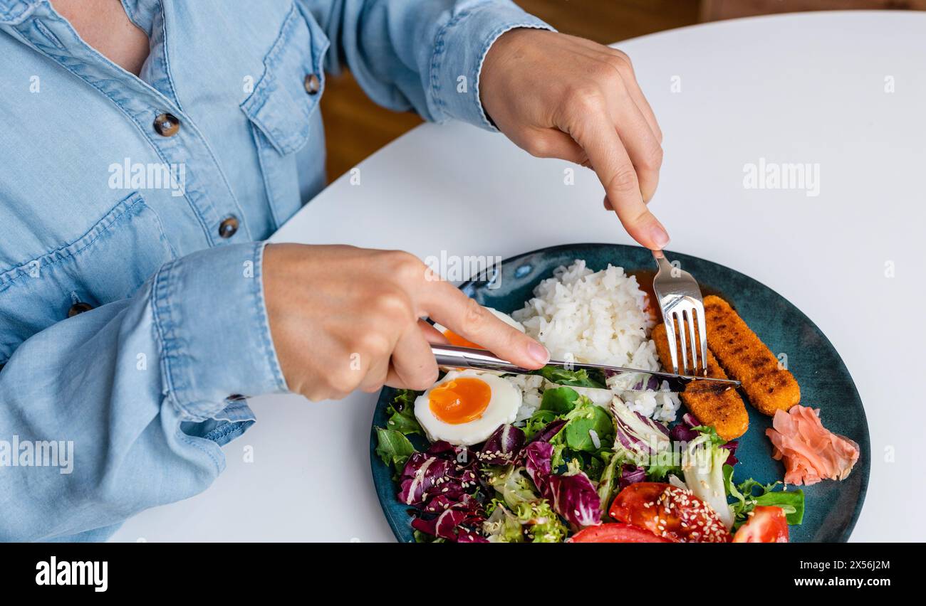 Female person eating healthy food at home. Dieting and healthy eating ...