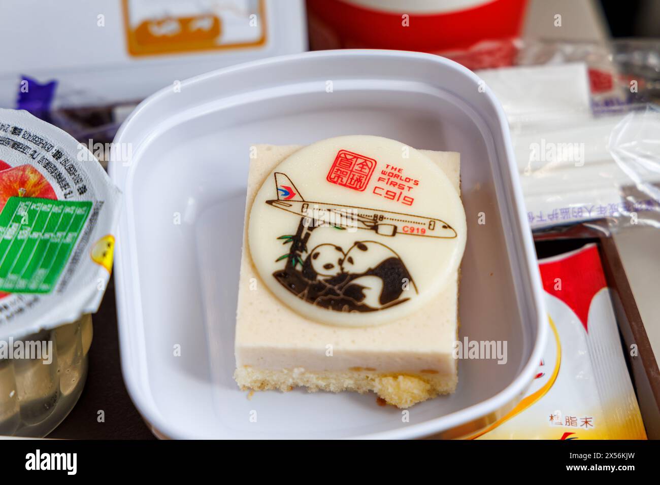 Chengdu, China - April 9, 2024: Cake For Dessert On Board The COMAC ...