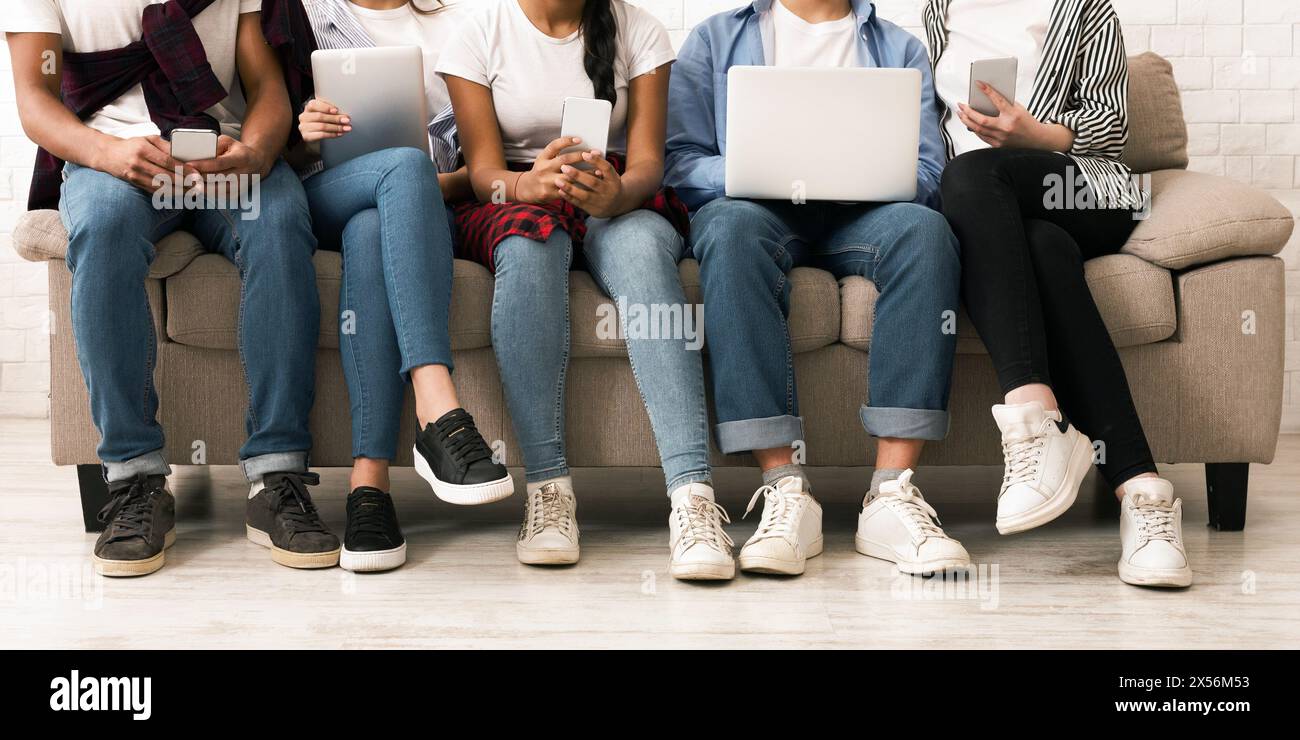 Group of Five Multiethnic Teenagers Using Digital Devices, Cropped ...