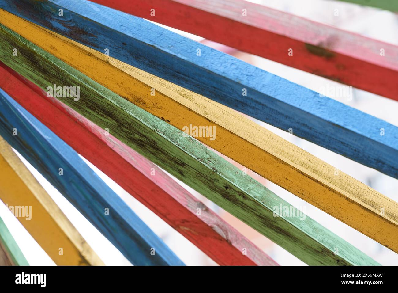 Detailed view of a vibrant wooden structure with multiple colors and ...