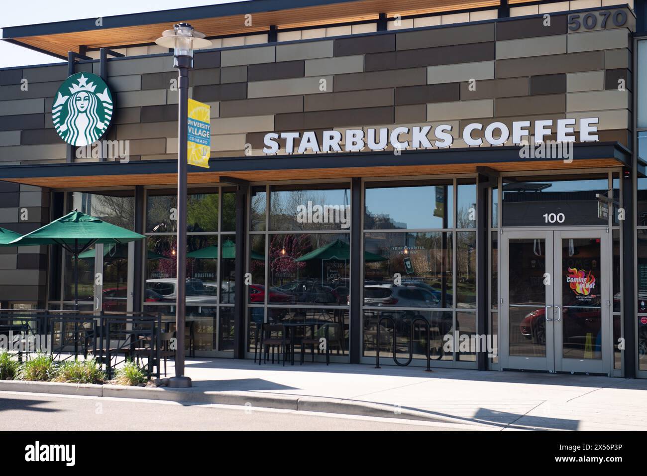 Exteriors of modern Starbucks coffee locations with drive thru windows ...