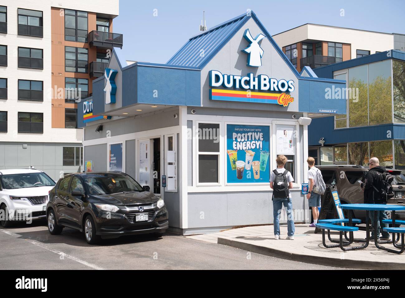 Drivers line up at the local Dutch Bros coffee shop drive thru, a fast ...