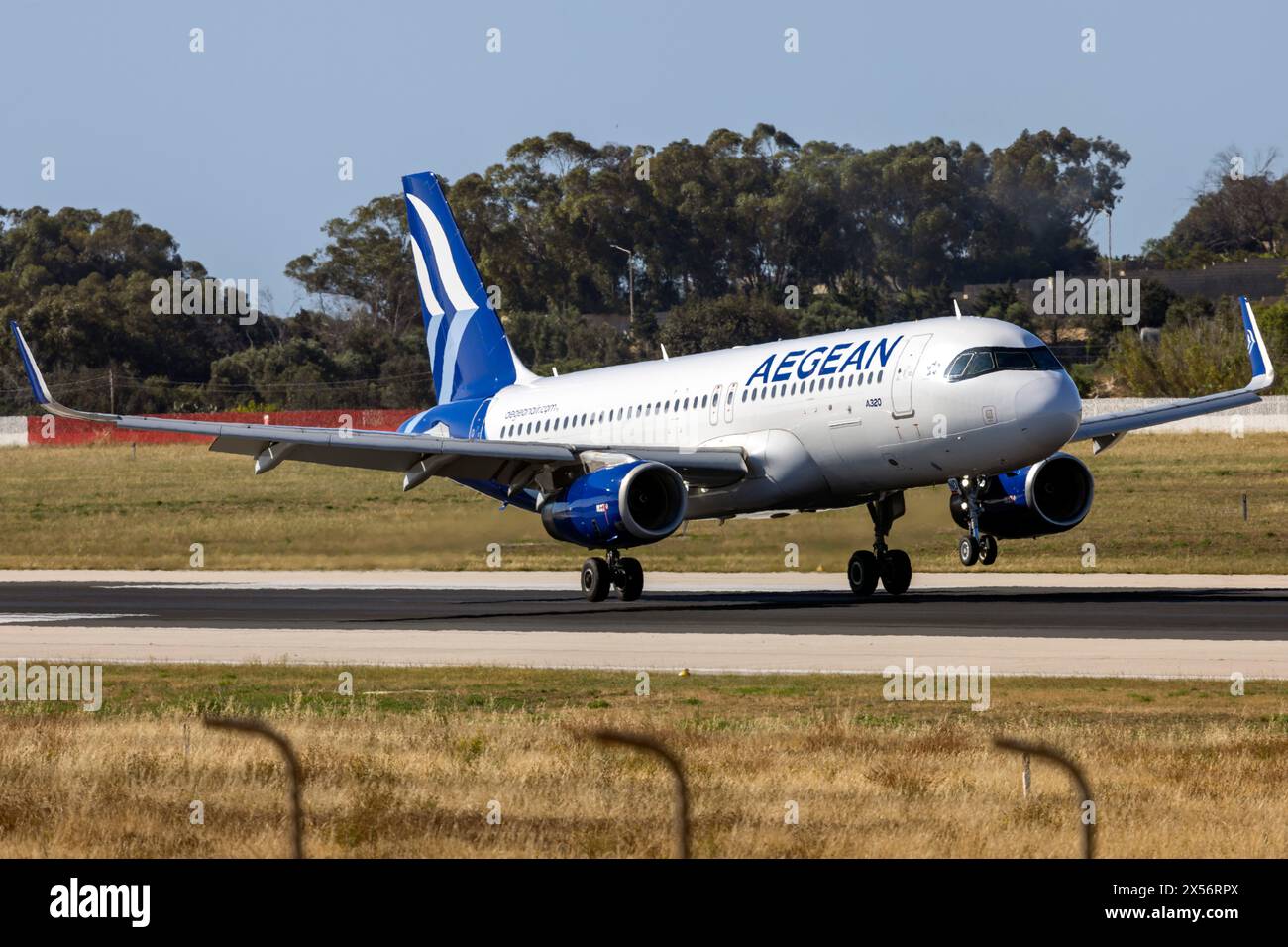 Aegean Airlines Airbus A320-232 (REG: SX-DND) just before touch down ...