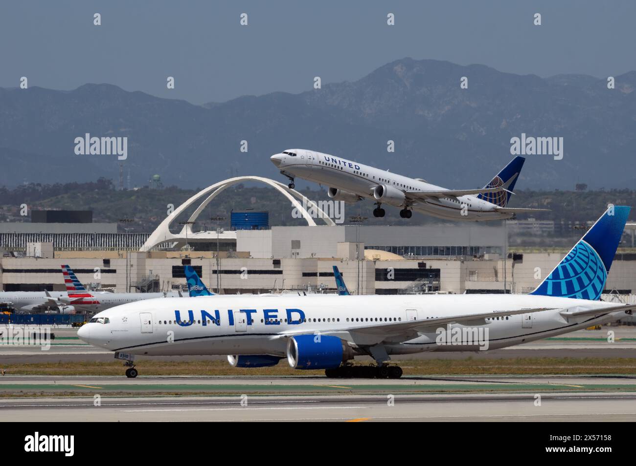 United Airlines Boeing 777 with registration N210UA shown taxiing at ...