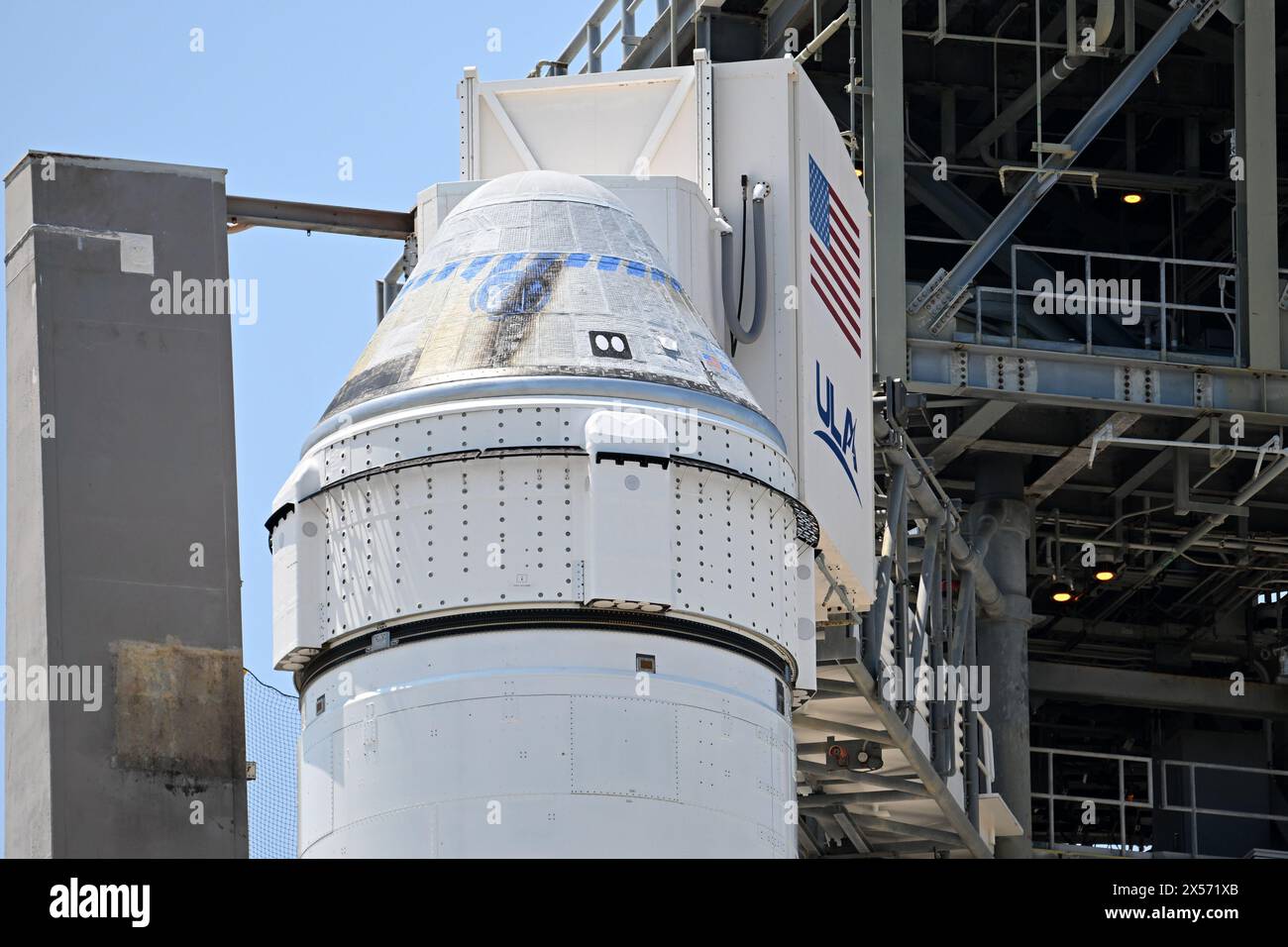 The Boeing Starliner spacecraft sits on top of the ULA Atlas V rocket ...