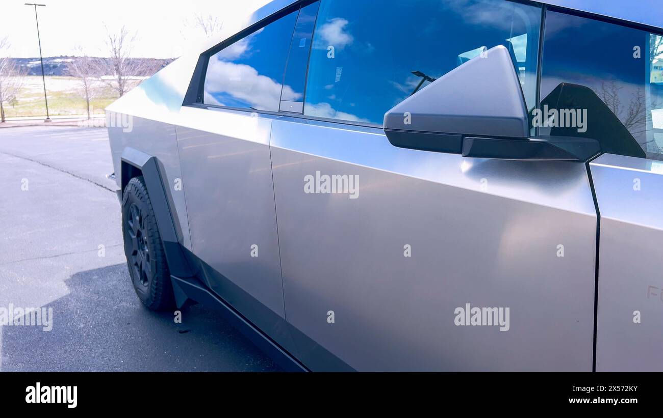 Sleek Tesla Cybertruck Parked in a Suburban Neighborhood Stock Photo ...