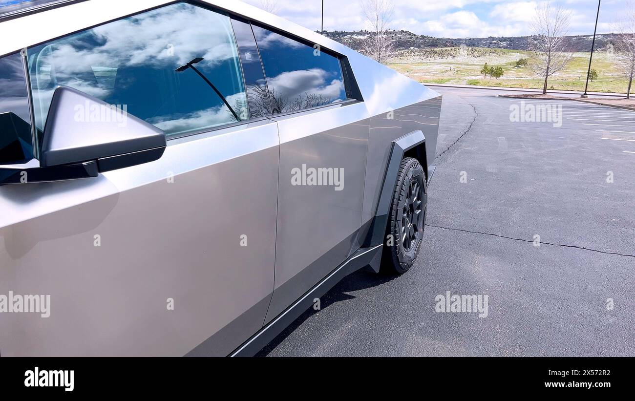 Sleek Tesla Cybertruck Parked in a Suburban Neighborhood Stock Photo ...
