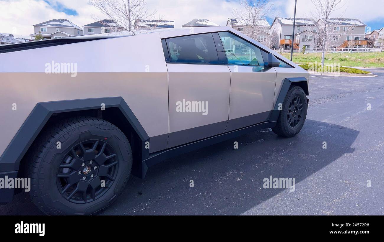Sleek Tesla Cybertruck Parked in a Suburban Neighborhood Stock Photo ...