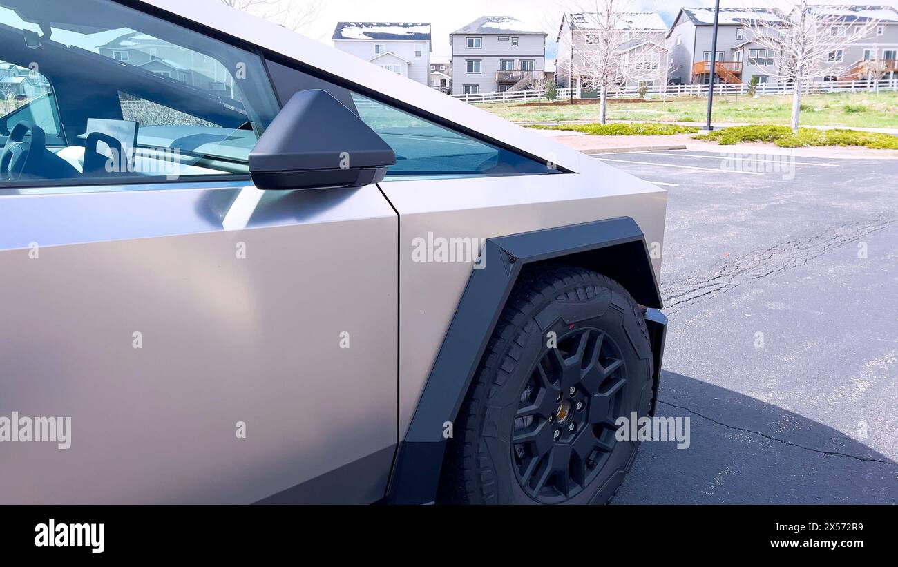 Sleek Tesla Cybertruck Parked in a Suburban Neighborhood Stock Photo ...