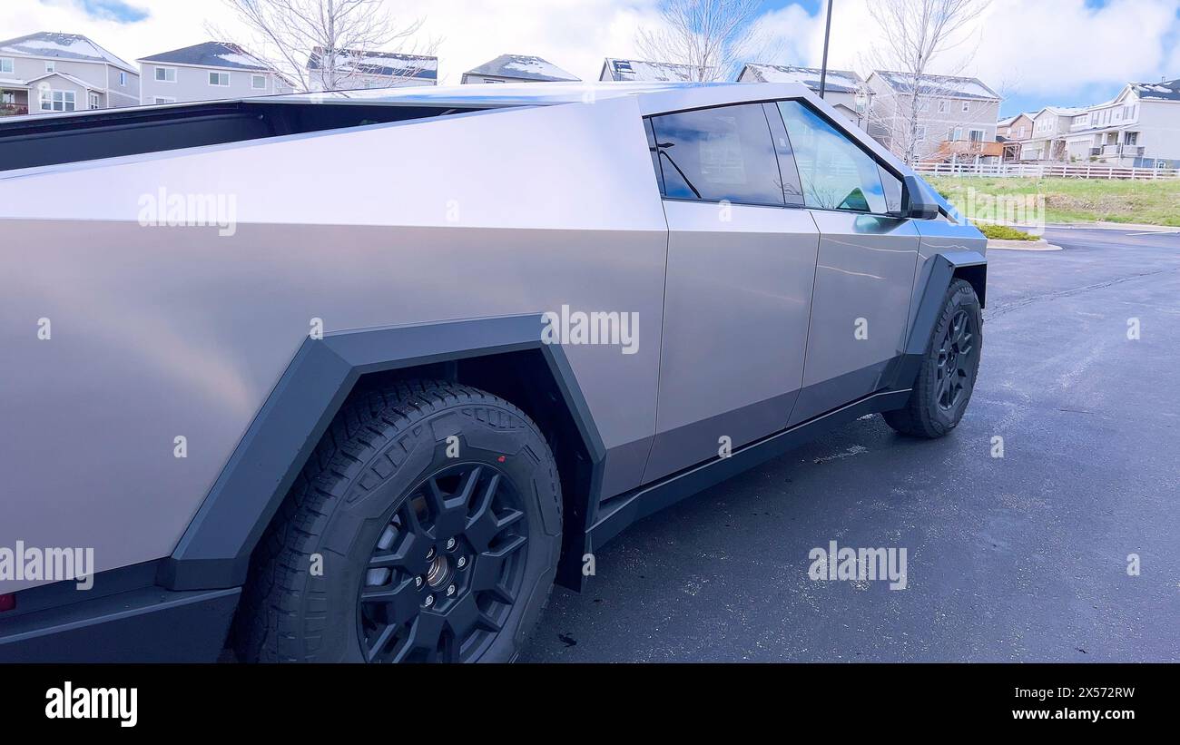 Sleek Tesla Cybertruck Parked in a Suburban Neighborhood Stock Photo ...