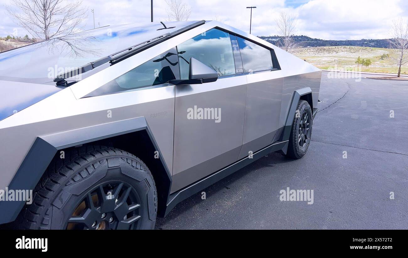 Sleek Tesla Cybertruck Parked in a Suburban Neighborhood Stock Photo ...