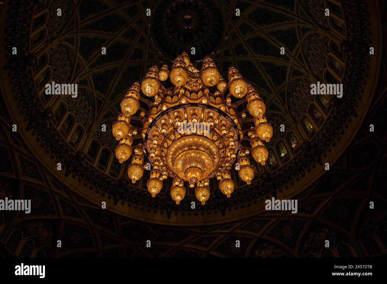 Bejeweled crystal and gold chandelier in the Sultan Qaboos Grand Mosque ...