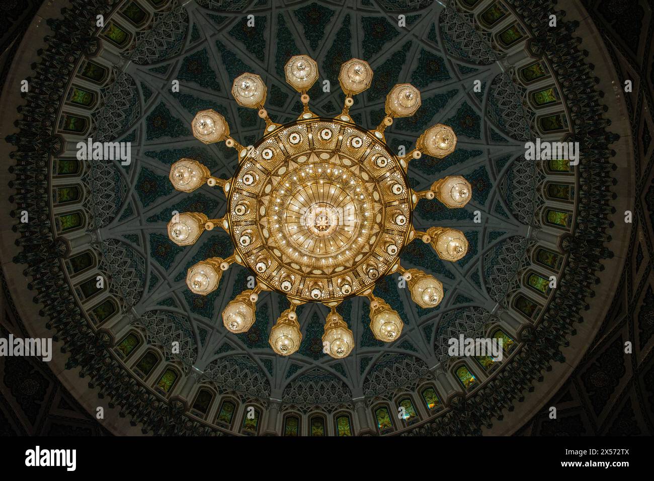 Bejeweled crystal and gold chandelier in the Sultan Qaboos Grand Mosque ...