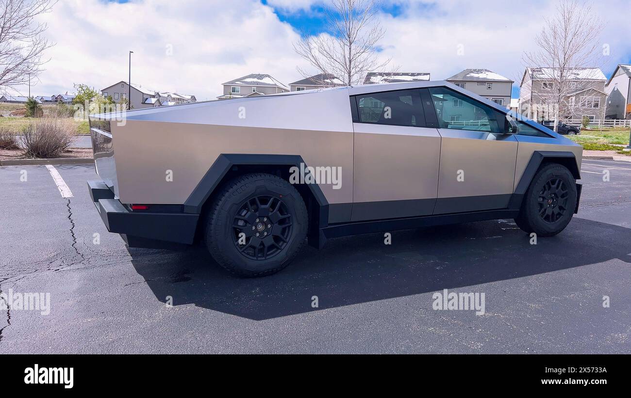 Sleek Tesla Cybertruck Parked in a Suburban Neighborhood Stock Photo ...