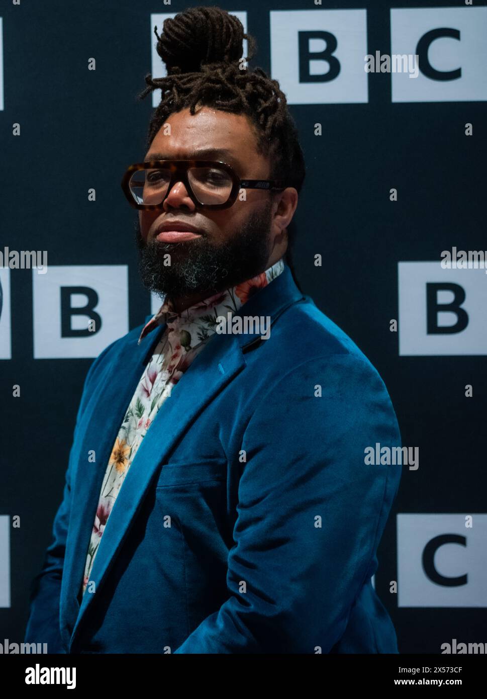 Barrington Robinson Poses on the red carpet before the Press Line event ...