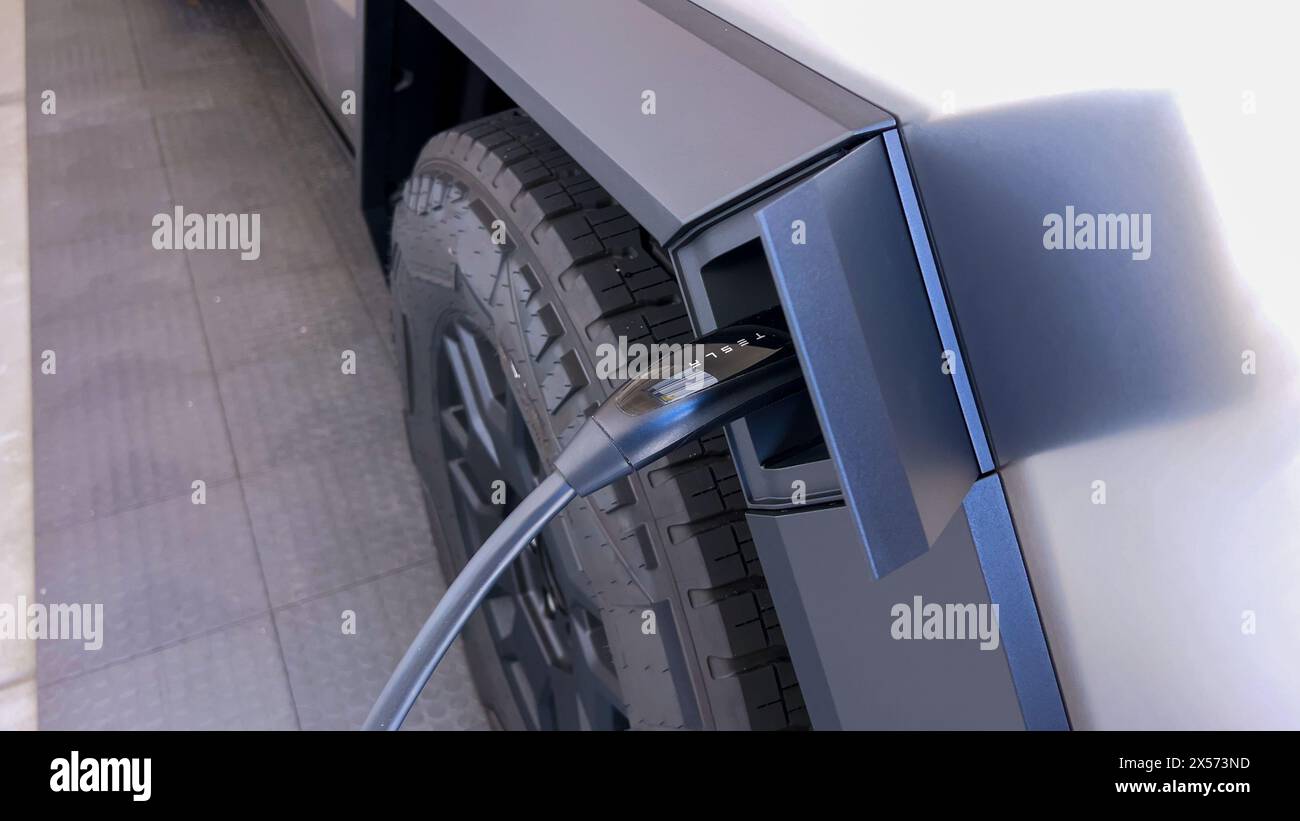 Charging a Tesla Cybertruck: Detailed View of the Connector and Port ...