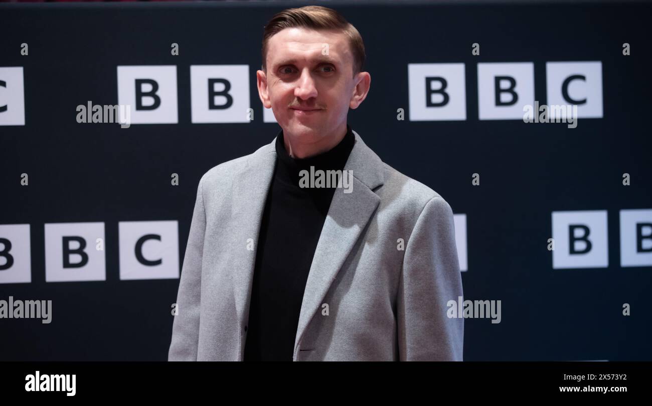 Phil McGuiness Poses on the red carpet before the Press Line event ...