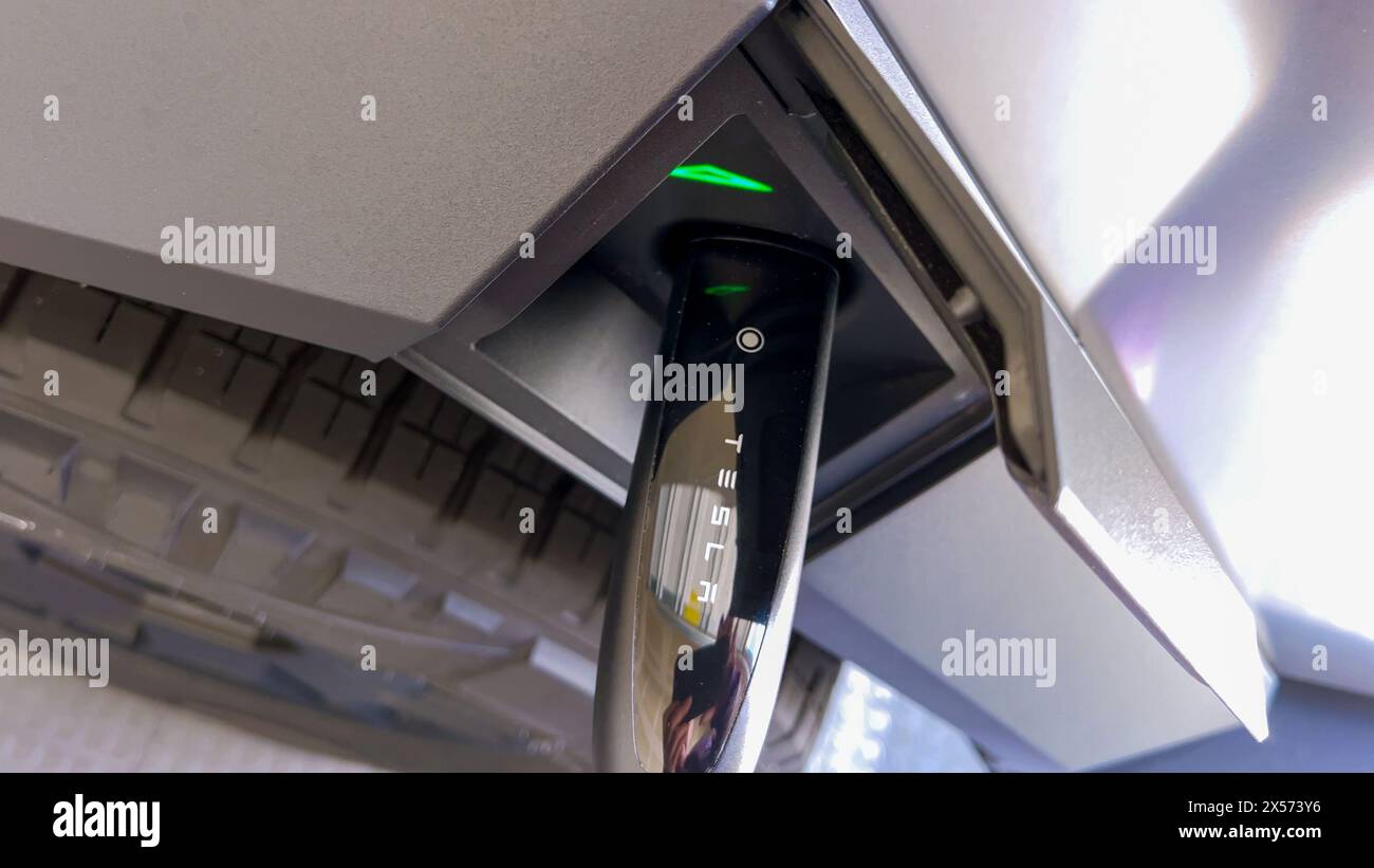 Charging a Tesla Cybertruck: Detailed View of the Connector and Port ...