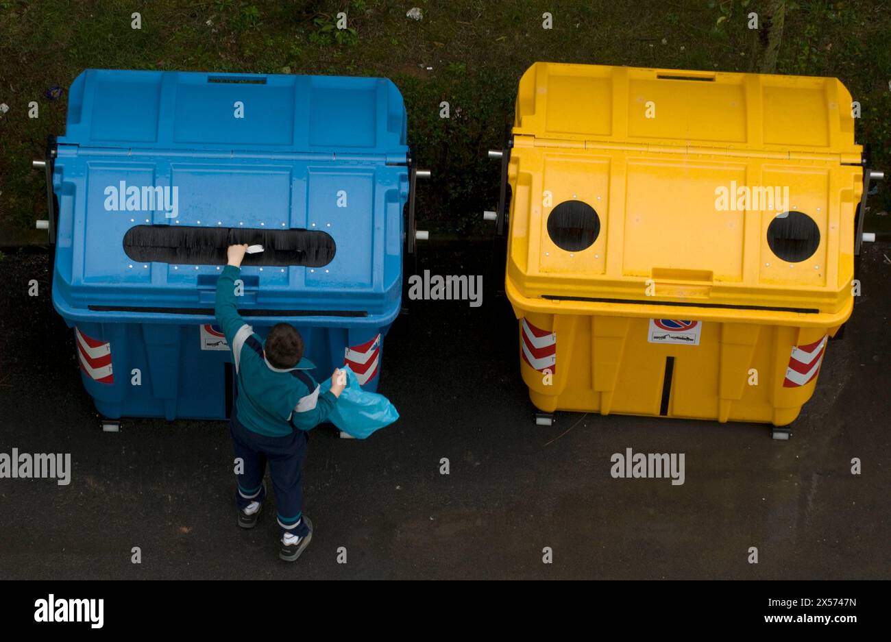 Recycling containers for paper and plastic Stock Photo - Alamy