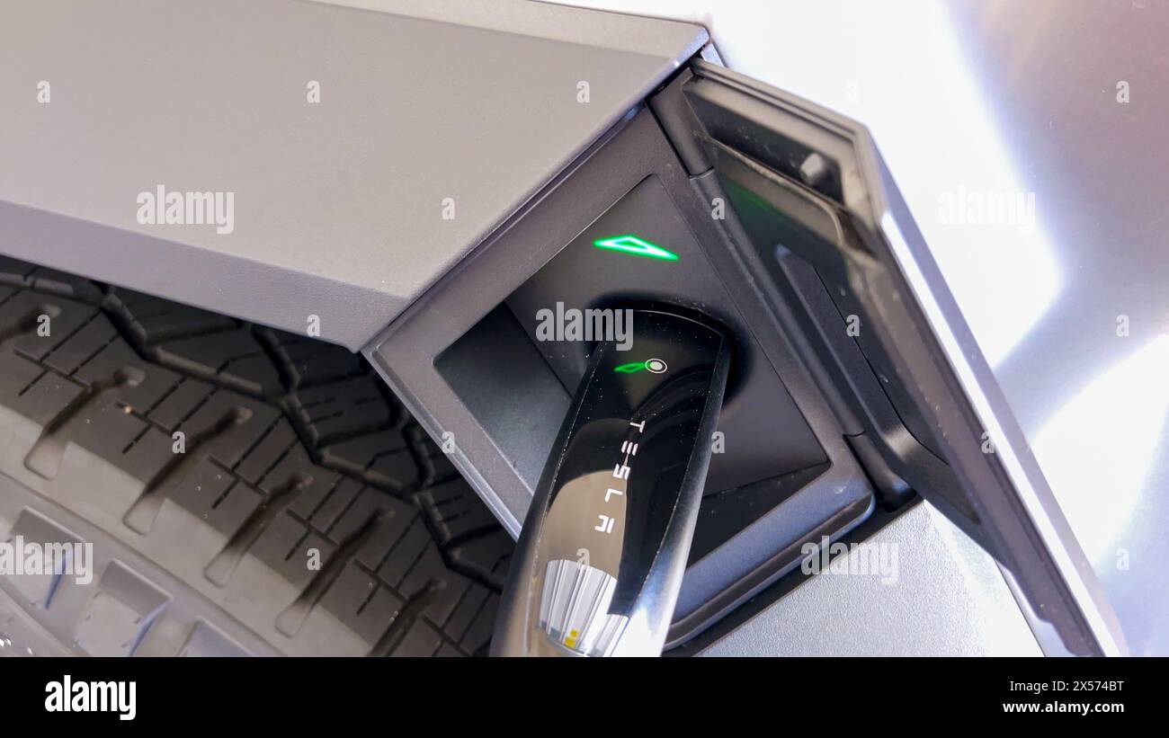 Charging a Tesla Cybertruck: Detailed View of the Connector and Port ...