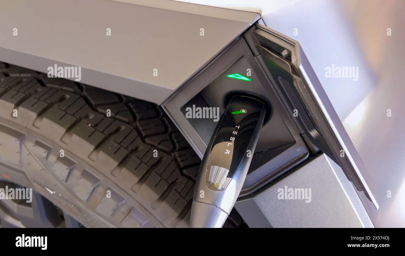 Charging a Tesla Cybertruck: Detailed View of the Connector and Port ...