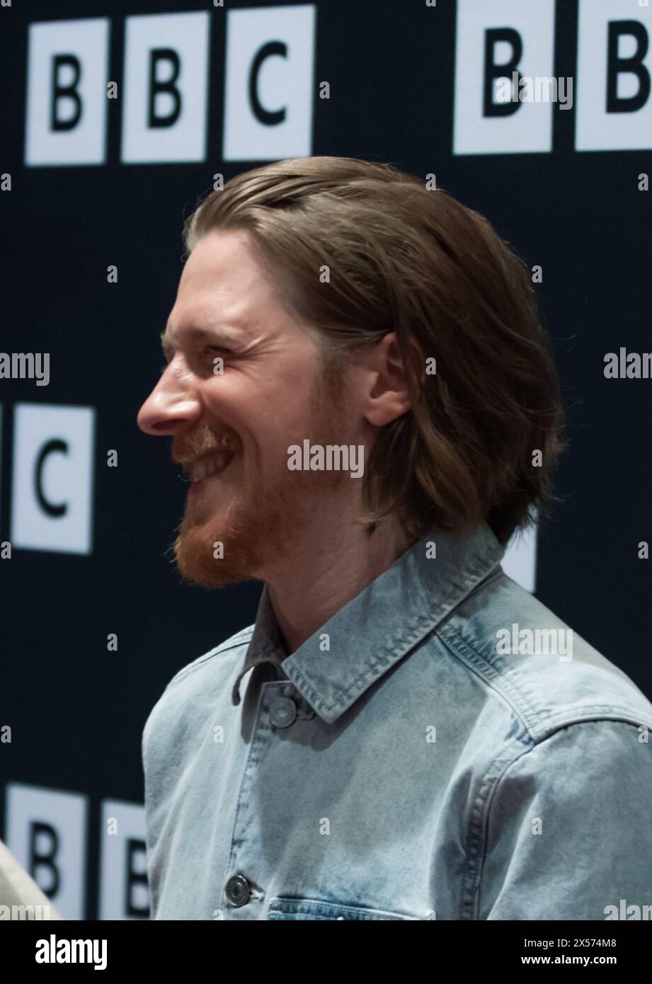 Adam Nagaitis Poses on the red carpet before the Press Line event ...