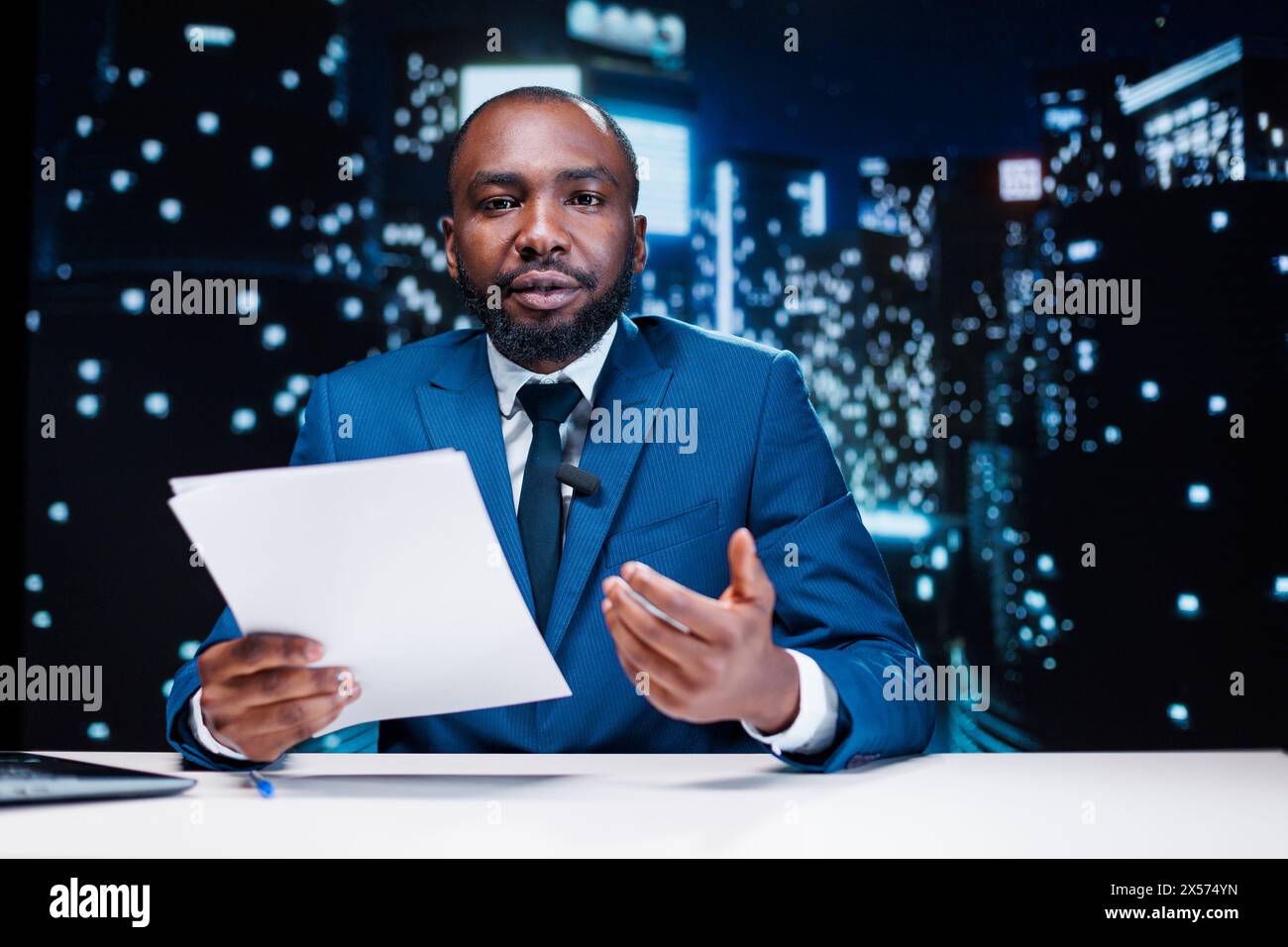 News anchor covering tv segment with breaking news stories and ...