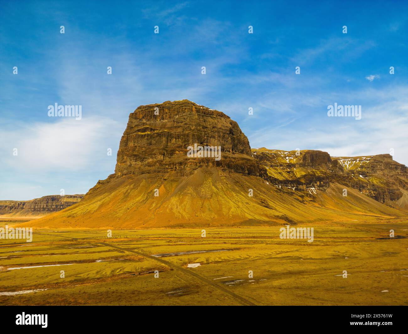 Aerial view of massive mountain range in iceland, huge slopes with ...