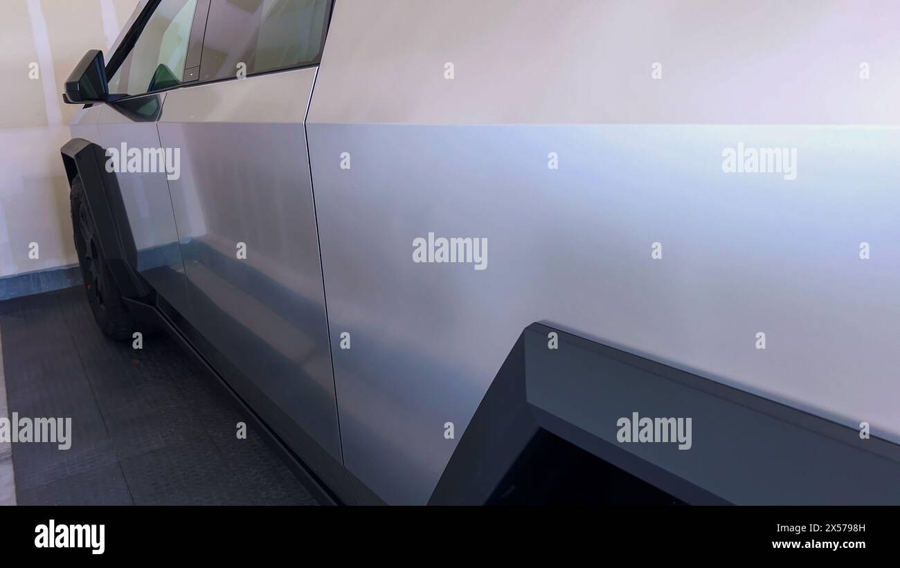 Detailed View of Tesla Cybertruck’s Angular Design and Textured Surface ...