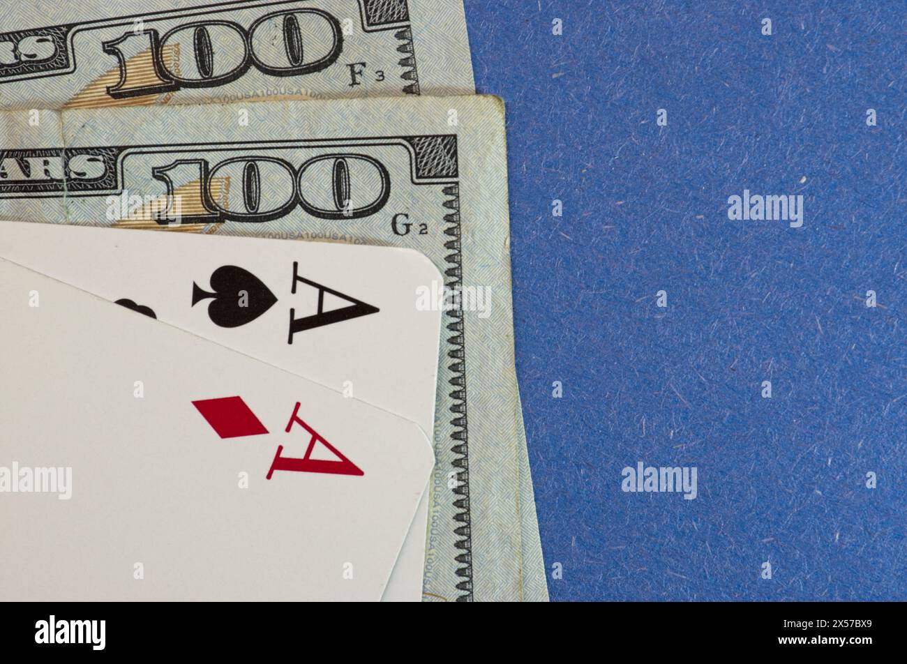 Two Aces and two 100 dollar bills Stock Photo - Alamy
