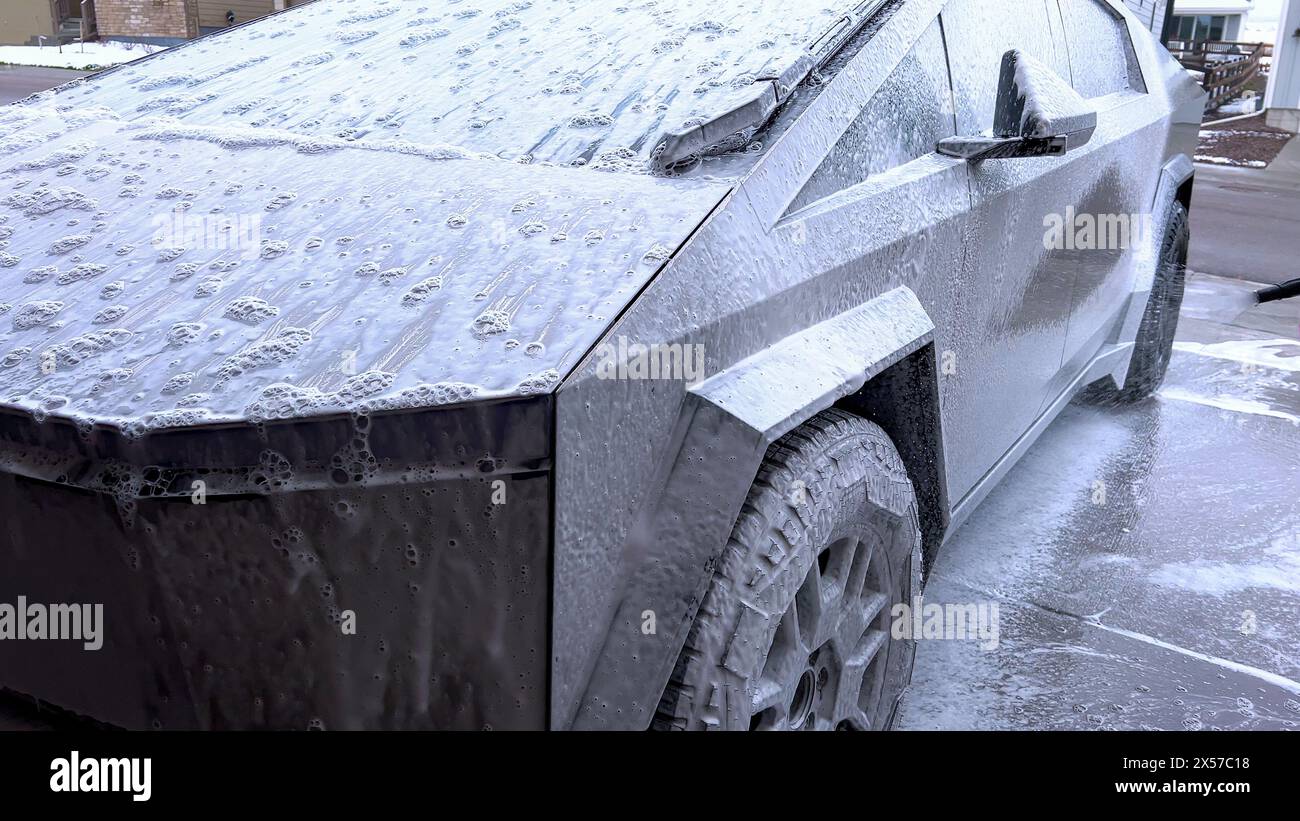 Washing a Tesla Cybertruck: Suds Covering Its Futuristic Exterior Stock ...