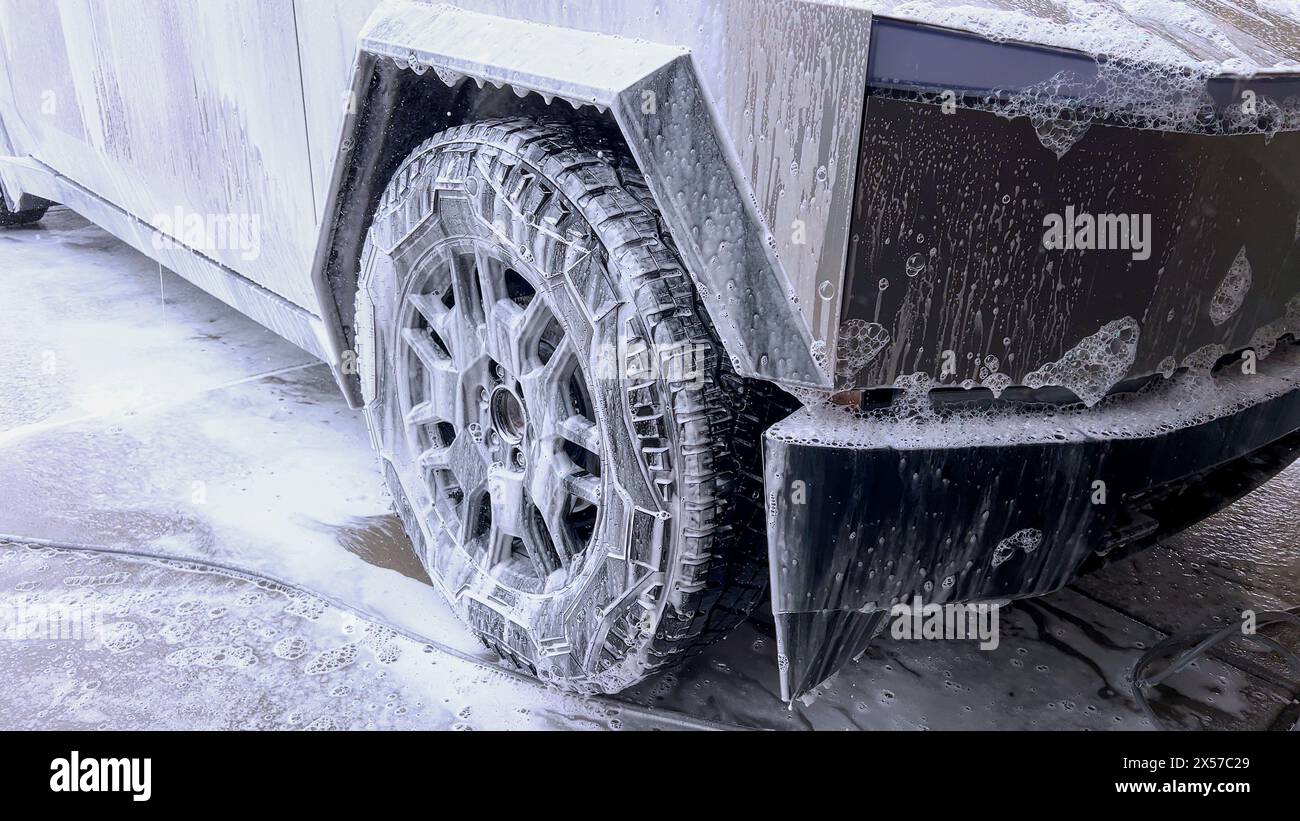 Washing a Tesla Cybertruck: Suds Covering Its Futuristic Exterior Stock ...