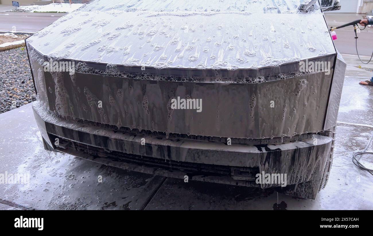 Washing a Tesla Cybertruck: Suds Covering Its Futuristic Exterior Stock ...