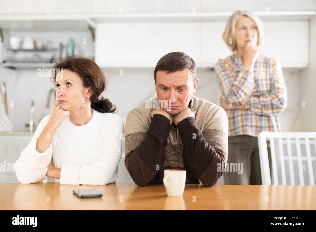 Family quarrel of three people Stock Photo - Alamy