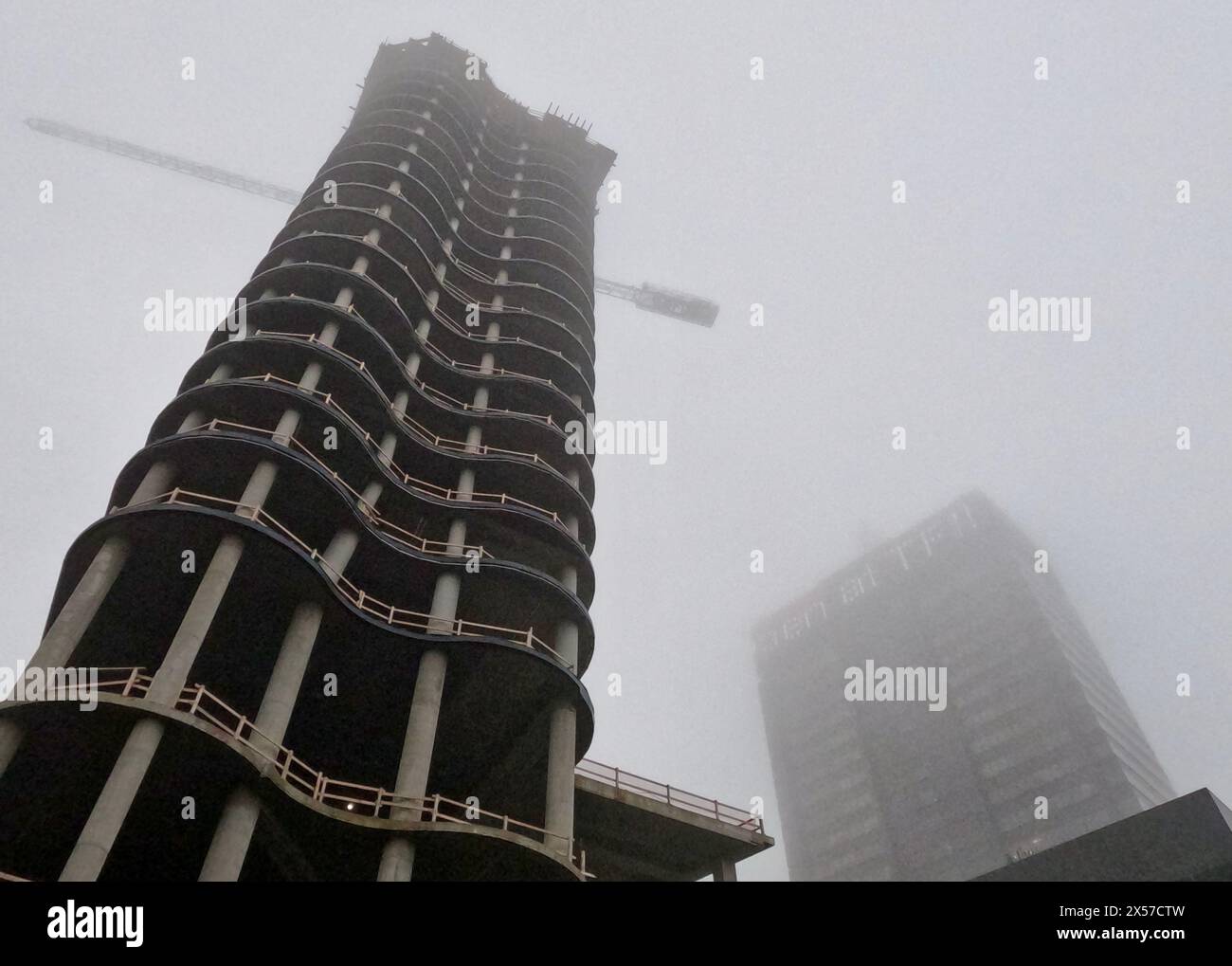 Fog shrouds the PECO tower (right) and the under-construction tower at ...