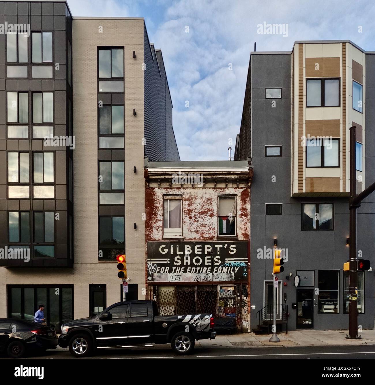 The old Gilbert's Shoes building sits sandwiched between new ...