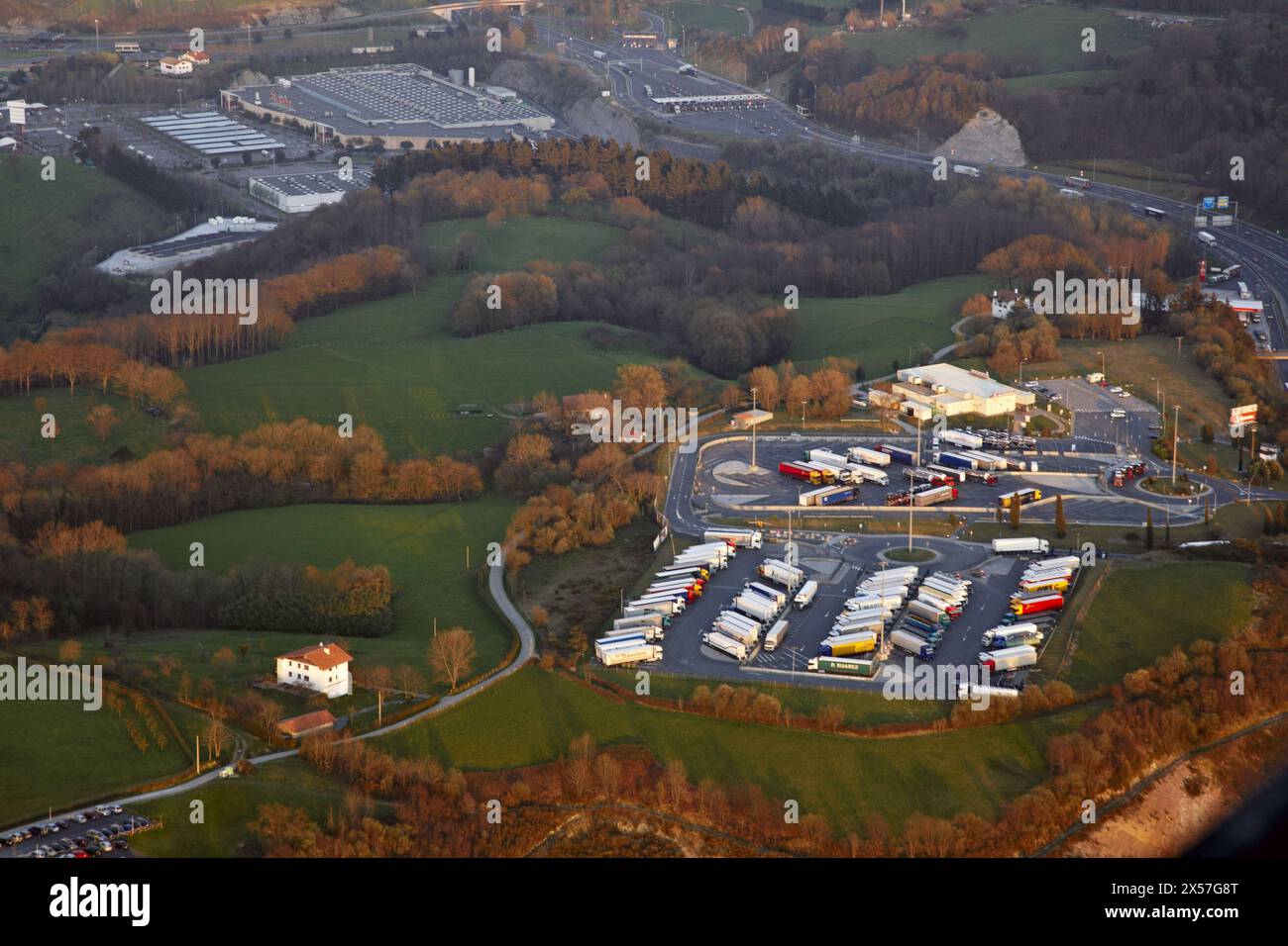 Parking lot for trucks, freeway A8 and Txingudi shopping mall in ...